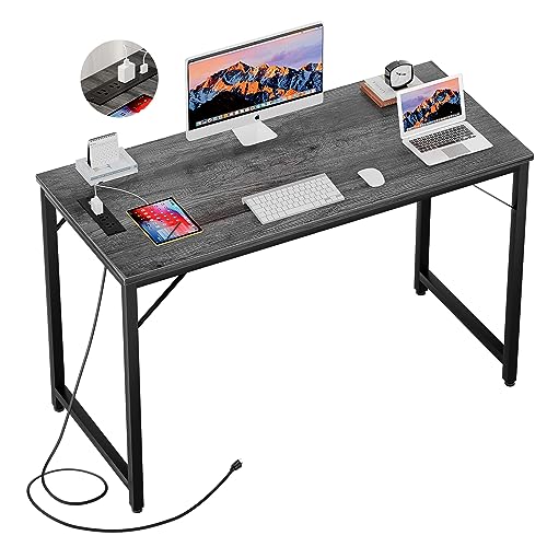 iSunirm Computer Desk with Power Outlets and USB Charging Ports, 48 Inch Modern Home Office Desks, Sturdy Student Writing Table, Simple Laptop PC Gaming Desk for Bedroom Workstation, Black Oak