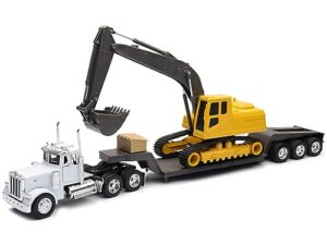 peterbilt 379 truck with lowboy trailer white and backhoe yellow long haul trucker series 1/32 diecast model by new ray 11283c