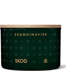 skandinavisk skog 'forest' scented candle. fragrance notes: pine needles and fir cones, birch sap and lily of the valley. 3.17 oz.