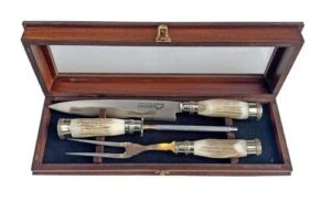 carving set with deer handle and double nickel silver and steel ferrule in a wooden box with a glass lid