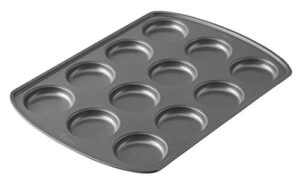 wilton perfect results premium non-stick bakeware muffin top pan - the shallow baking cups make perfect muffin tops, drop cookies or whoopie pie shells, 12-cavity, steel