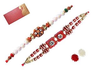 purpledip rakhi set in designer shagun envelope for brother: roli chawal tika & 2 rakshabandhan bracelets (rakhi39r)