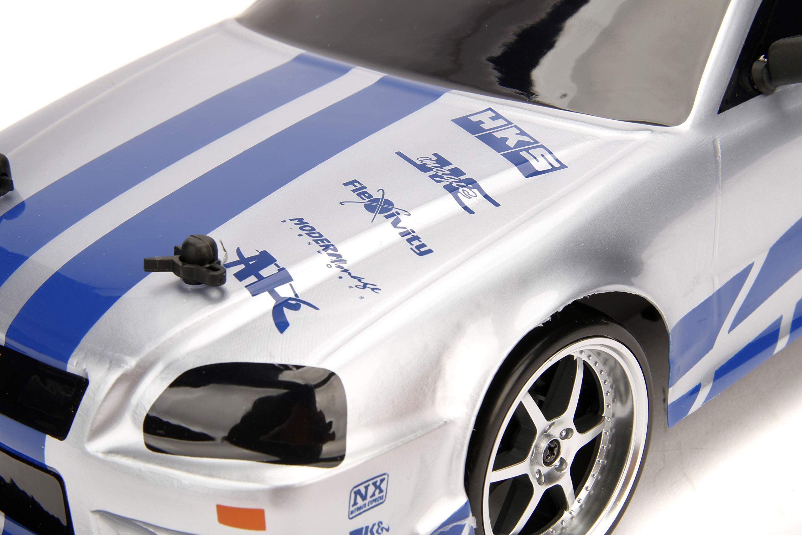 Jada Toys Fast & Furious Brian's Nissan Skyline GT-R (BN34) Drift Power Slide RC Radio Remote Control Toy Race Car with Extra Tires, 1:10 Scale, Silver/Blue (99701)