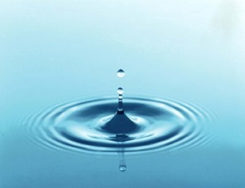 Drops rising from ripples in blue water Poster Print by Panoramic Images (24 x 19)