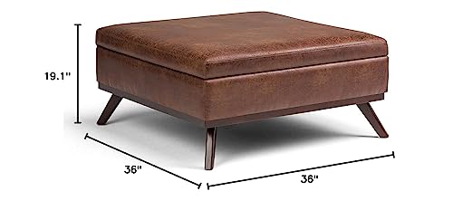 SIMPLIHOME Owen 36 Inch Wide Mid Century Modern Square Coffee Table Lift Top Storage Ottoman in Upholstered Distressed Saddle Brown Faux Leather, For the Living Room