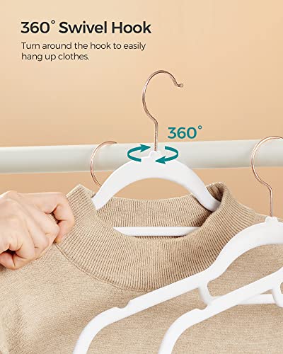 SONGMICS Velvet Hangers, Set of 50 Clothes Hanger with Rose Gold Swivel Hook, Non-Slip, and Space-Saving, 0.2-Inch Thick, 17.1-Inch Long for Coat, Shirt, Dress, Pants, Tie, White UCRF021W02