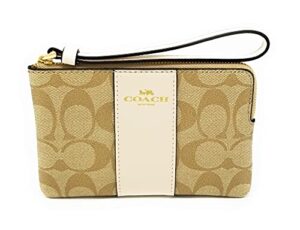 coach women's corner zip wristlet in signature canvas (light khaki - chalk)