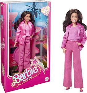 barbie the movie doll, gloria collectible wearing three-piece pink power pantsuit with strappy heels and golden earrings