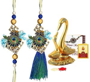 tied ribbons rakhi for brother and bhabhi with gift set | swan statue | rakhi thread | roli chwal tika - raksha bandhan bhai bhabhi rakhi set | rakhi card | lumba rakhi for bhabhi