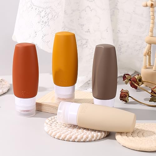 LIYUABU Silicone Travel Bottles for Toiletries,Tsa Approved 3oz 4Pack Portable Refillable Travel Bottles,Leak Proof BPA Free Squeezable Travel Size Containers Accessories with Toiletry Bag（Brown）