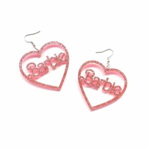 cute pair of glitter pink heart large earrings with name barbie. great pair of 1980’s style costume earrings for 1980’s costumes, cute dress up parties, and more. great pair of pink heart earrings with glitter. super cute large pair of heart earrings for