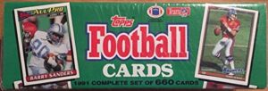 1991 topps football factory sealed 660 card set. loaded with stars including emmitt smith, jerry rice, john elway, troy aikman, joe montana, bo jackson, barry sanders, dan marino and many others!