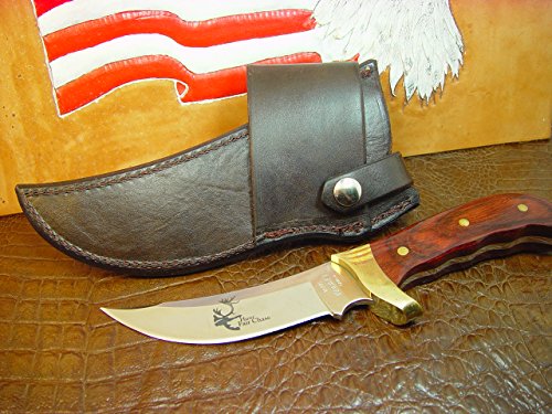 Custom-made Cross Draw Knife Sheath for the Buck Kalinga 401 Knife. The Sheath Is Made Out of 10 Ounce Water Buffalo Hide Leather. The 10 oz. Leather is Dyed Dark Brown. The Sheath Also Has a Strap for Extra Security of Your Knife From Falling Out. The Sh