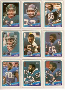 new york giants 1988 topps football team set (16 cards)** george adams, raul allegre, carl banks, mark bavaro, harry carson, erik howard, pepper johnson, terry kinard, sean landeta, leonard marshall, lionel manuel, joe morris, lee rouson, phil simms and l