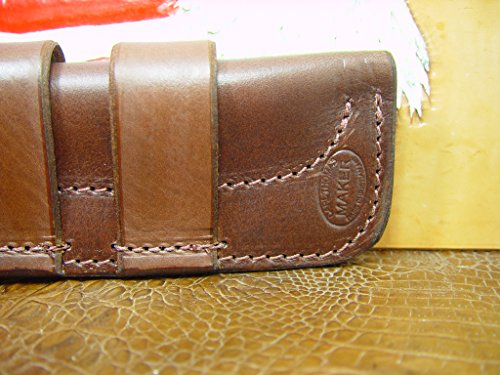 Custom Made Cross Draw Knife Sheath That Will fit The SOG Seal pup Light Brown. A lot of Leather for The Price and can be Worn on The Left or Right Hand Side. Sheath only.