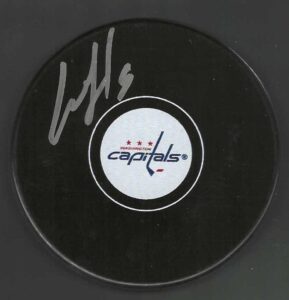 dmitry orlov signed washington capitals puck - autographed nhl pucks