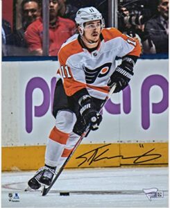 travis konecny philadelphia flyers autographed 8" x 10" white jersey skating photograph - autographed nhl photos