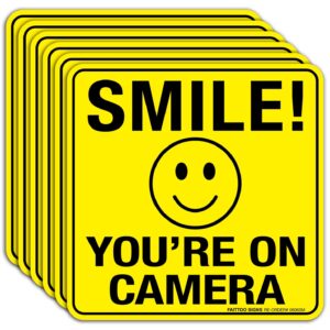 Smile You're On Camera Sign Stickers 6 Pack - 6 x 6 Inches- 4 Mil Vinyl - Laminated for Ultimate UV, Weather, Scratch, Water and Fade Resistance - Easy To Stick - Use for CCTV Security Camera