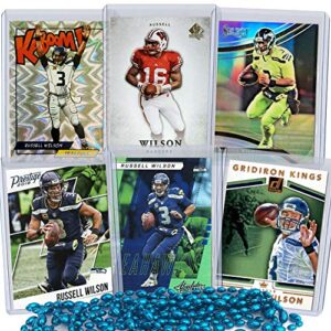 russell wilson football card bundle, set of 6 assorted seattle seahawks and wisconsin badgers mint football cards of quarterback super bowl champion russell wilson, protected by sleeve and toploader