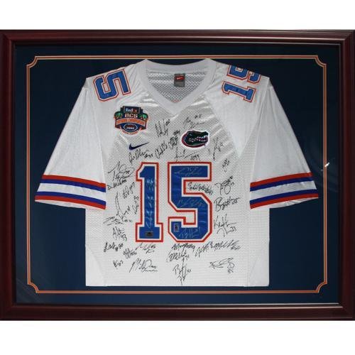 2008 Florida Gators National Champions Team And Urban Meyer Autographed (White #15 Nike) Deluxe Framed Jersey – 35 Signatures, Tim Tebow - Autographed College Jerseys