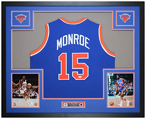 Earl Monroe Autographed Blue New York Knicks Jersey - Beautifully Matted and Framed - Hand Signed By Monroe and Certified Authentic by JSA - Includes Certificate of Authenticity