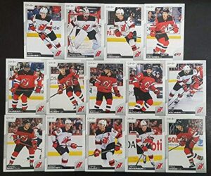 2020-21 o-pee-chee opc new jersey devils base team set of 13 cards: #12 travis zajac #38 miles wood #47 p.k. subban #48 nico hischier #70 jack hughes #133 nikita gusev #156 jesper boqvist #207 pavel zacha #212 jesper bratt #294 kyle palmieri #356 mackenzi