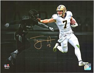 taysom hill new orleans saints autographed 11" x 14" white jersey spotlight photograph - autographed nfl photos