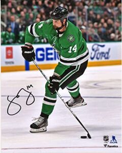 jamie benn dallas stars autographed 8" x 10" green jersey shooting photograph - autographed nhl photos