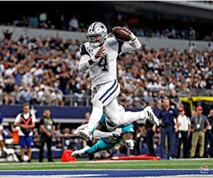 the cowboys dak prescott rushing for a td 8x10 photo picture