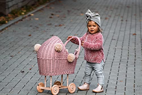 CACKOO Handmade Wicker Pram For Dolls With Cotton Bedding Sheets And Handmade Pom-Poms Ideal As Birthday Gift Natural Pink