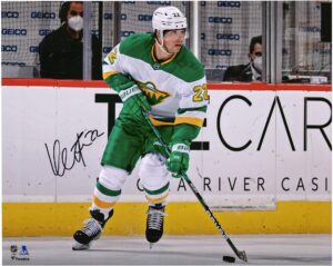 kevin fiala minnesota wild autographed 16" x 20" reverse retro jersey skating photograph - autographed nhl photos