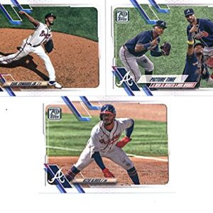 2021 Topps Complete (Series 1 & 2) Atlanta Braves Team Set of 25 Cards which includes: Max Fried(#9), A Playful Bout of Juniors(#61), Travis d'Arnaud(#101), Austin Riley(#111), Freddie Freeman(#120), Cristian Pache(#187), Atlanta Braves(#194), Mike Foltyn