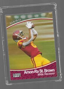 2021 sage hit premier draft #117 amon-ra st. brown pre-rookie ncaa football trading card in raw (nm or better) condition