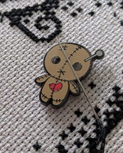 voodoo doll needle minder