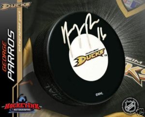 george parros signed anaheim ducks puck - autographed nhl pucks