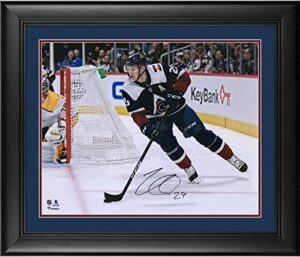 nathan mackinnon colorado avalanche framed autographed 16" x 20" navy jersey skating photograph - autographed nhl photos