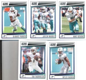 2022 score veteran miami dolphins team set of 10 cards: devante parker(#271), jaylen waddle(#272), mike gesicki(#273), tua tagovailoa(#274), myles gaskin(#275), jaelan phillips(#276), xavien howard(#277), dan marino(#278), jason taylor(#279), ricky willia