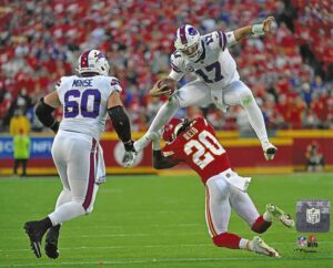 buffalo bills quarterback josh allen hurdles over defenders over the chiefs defenders, again! 8x10 action photo picture