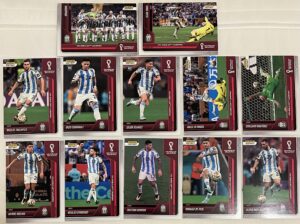 2022 panini instant world cup champions argentina team set -12 total cards including lionel messi, julian alvarez rc, angel di maria, alexis mac allister, rodrigo de paul, enzo fernandez rc, nahuel molina, nicolas otamendi, cristian romero, nicolas taglia