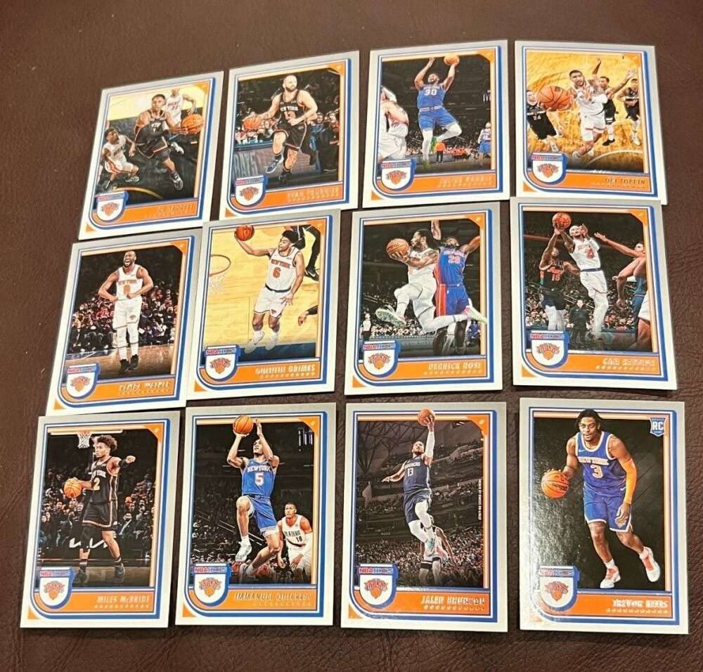 2022-23 Panini NBA Hoops New York Knicks Team Set Includes Rookies (Hand Collated) of 12 Cards: #18 RJ Barrett #19 Evan Fournier #20 Julius Randle #21 Obi Toppin #22 Kemba Walker #23 Quentin Grimes #24 Derrick Rose #25 Cam Reddish #27 Miles McBride #28 Im