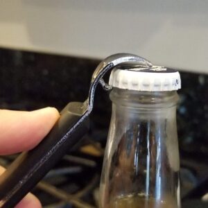 Handy Housewares Dual-Sided Handheld Can Punch/Bottle Opener - Ideal for Opening Soda Pop Caps or Beer Tops