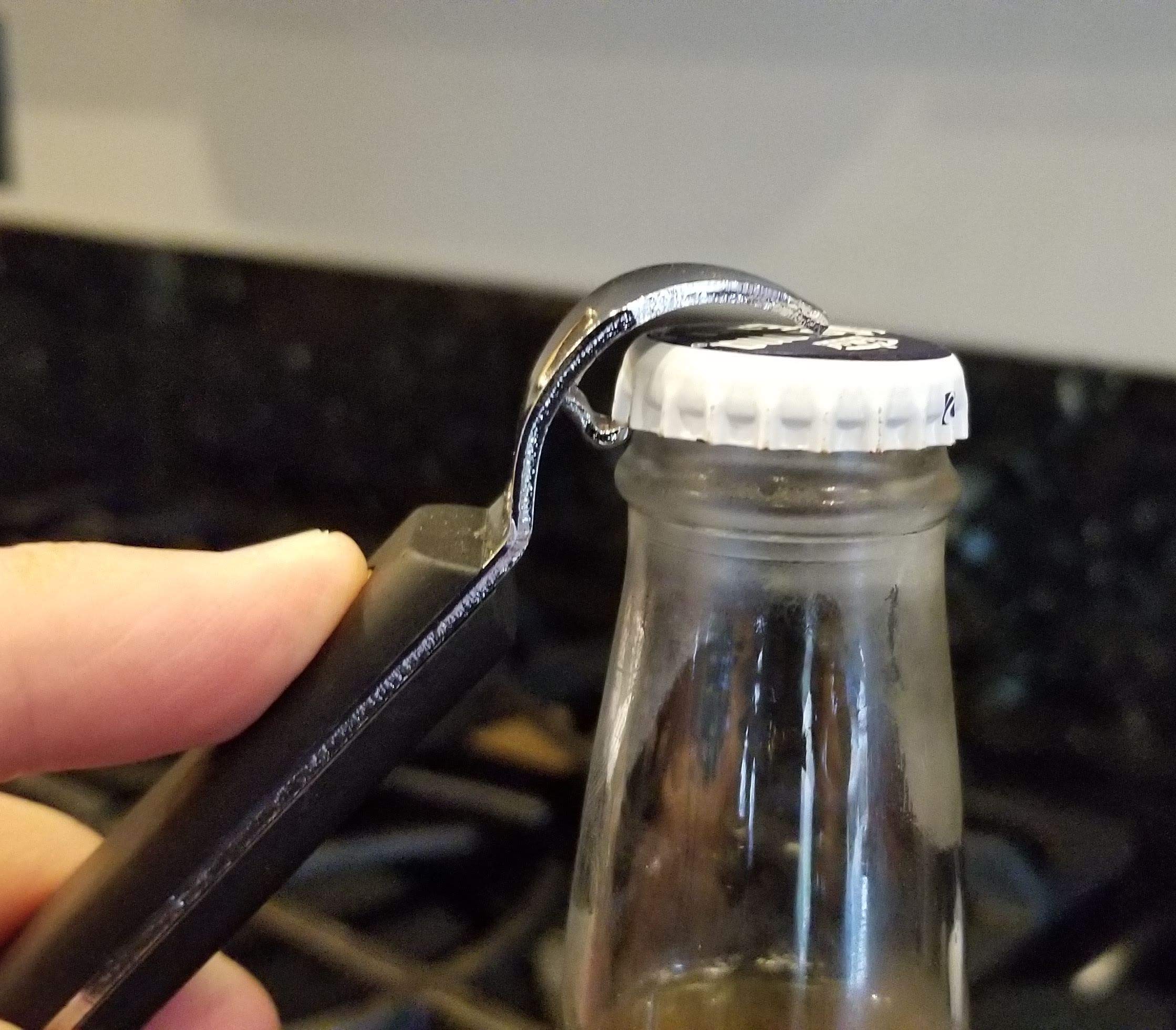 Handy Housewares Dual-Sided Handheld Can Punch/Bottle Opener - Ideal for Opening Soda Pop Caps or Beer Tops