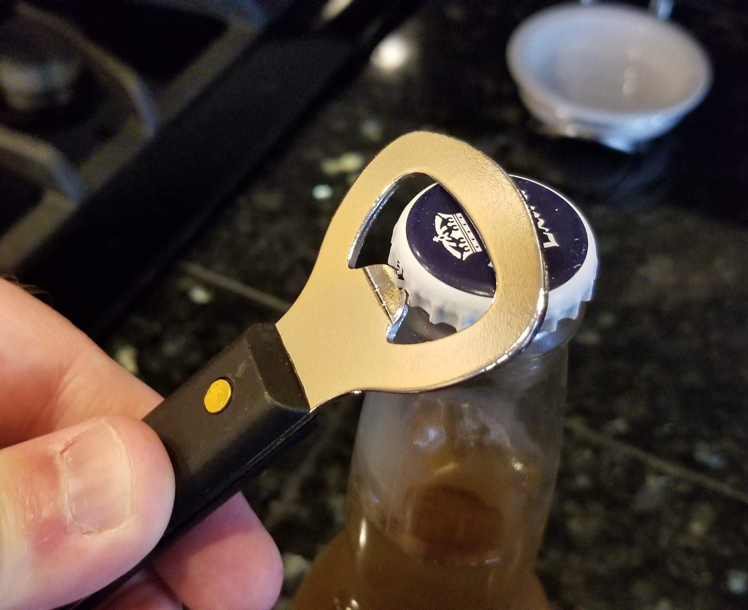 Handy Housewares Dual-Sided Handheld Can Punch/Bottle Opener - Ideal for Opening Soda Pop Caps or Beer Tops