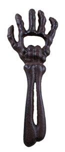 upper deck cast iron skeleton hand themed beverage bottle opener