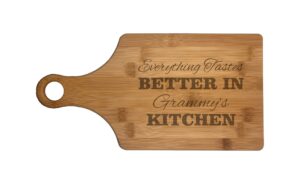 grandma gift everthing tastes better in grammy's kitchen engraved cutting board paddle shaped cooking (bamboo)