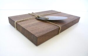 walnut solid wood cutting board. premium. luxury style. handcrafted in chicago. butcher block style. made in usa. oiled & ready for use! 8"x5"x3/4"