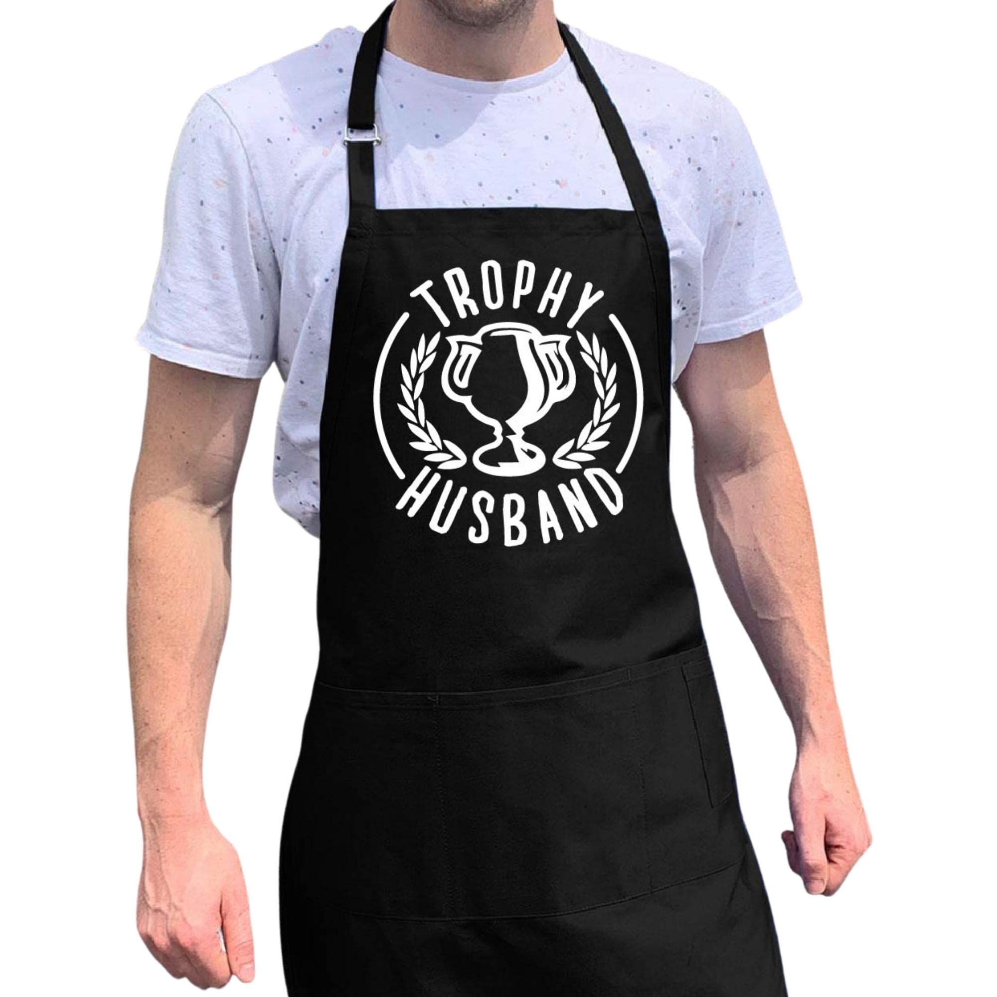 ApronMen Trophy Husband Funny Aprons For Men - Adjustable Straps - One Size Fits All Grilling Apron With Pockets - Professionally Printed Gift For Dad Or House Husband - Cotton Kitchen BBQ Chef Apron