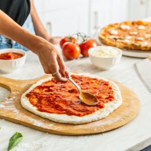 Cuzi Gourmet 4-Piece Large Pizza Stone Set - 13" Thermal Shock Resistant Cordierite Pizza Stone with Handle Rack, 19" Natural Bamboo Pizza Peel & Pizza Cutter - Large Baking Stone for Grill and Oven