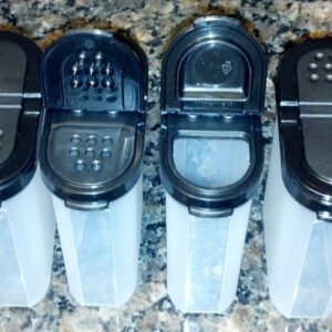 Tupperware Large Spice Shaker Set of Four. Black Seals