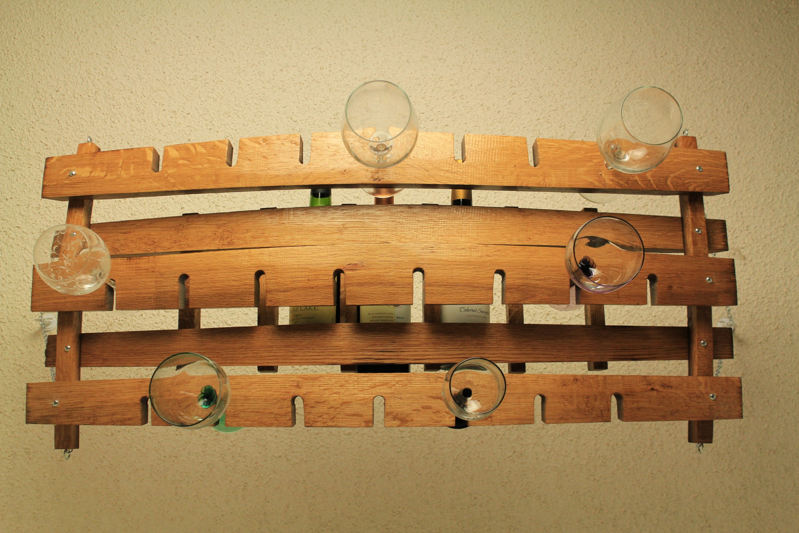 Hanging wine bottle and glass rack made from oak wine barrel staves